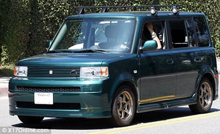 Tom Hanks rides around LA in a monstrous green electric car